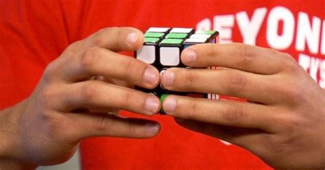 Rubiks Cube Champion Solves A Cube Blindfolded Huffpost Videos