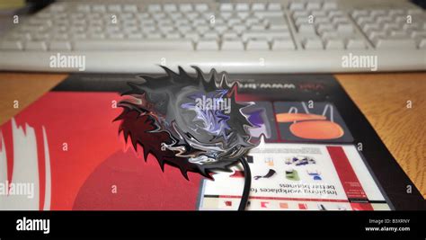 Distorted Computer IT Mouse On Red Mousemat With Keyboard In Background Stock Photo Alamy