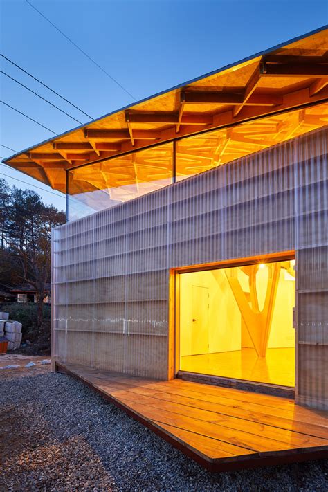Entwining Timber Structures Define Structure Of The House Of Three Trees