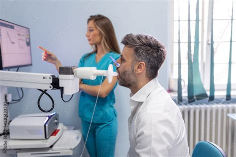 Man Testing Breathing Function By Spirometry Diagnosis Of Respiratory Function In Pulmonary