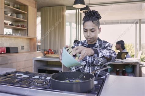 Boy Cooking In Kitchen Stock Image F0446483 Science Photo Library