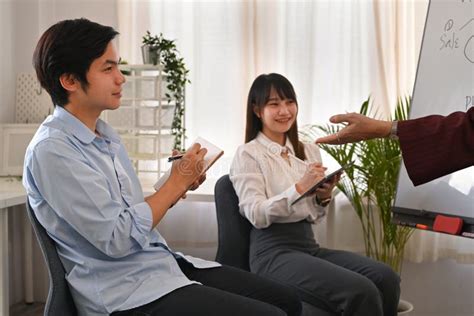 Image Of Developer Team Collaborating On Mobile Application Software Design Project Together At