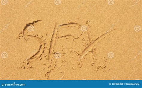 The Sea Wave Erases The Inscriptions Written On The Sand Top View