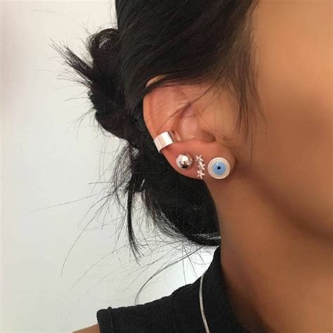تصاویر مدل های پیرسینگ گوش دخترانه شیک و خاص مدل های مینیمال و سنگین