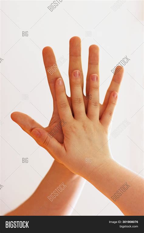 Large Hand Small Hand Image And Photo Free Trial Bigstock