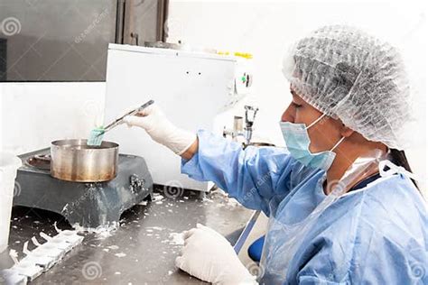 Scientist Embedding Tissues In Paraffin Blocks For Sectioning Pathology Laboratory Stock Image