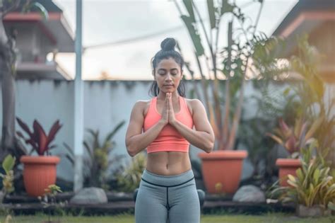 Premium Photo Indian Women Practicing Exercise Routine In A Garden Premium Photo Indian Women Practicing Exercise Routine In A Garden