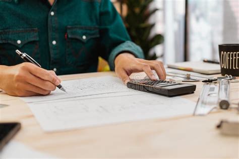 Close Up Architect Or Engineer Pressing On Calculator For Calculating Value Estimating For