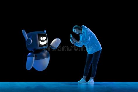 Composite Image Of Young Woman Interacting With 3d Model Of Robot