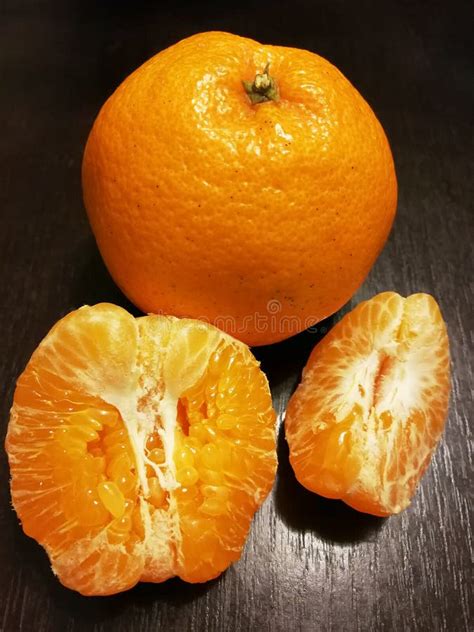 Peeled Mandarin Orange On Black Stock Image Image Of Black