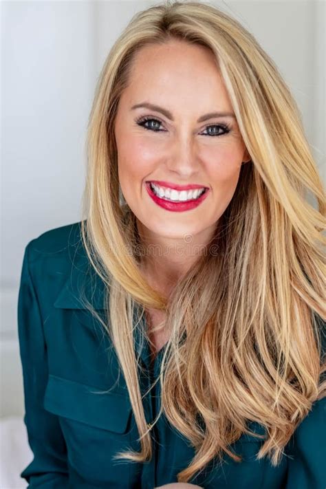 Timeless Allure Beautiful Blonde Strikes A Poised Pose Embodying Elegance And Grace In A