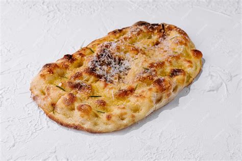 Premium Photo Freshly Baked Cheesy Flatbread On White Background