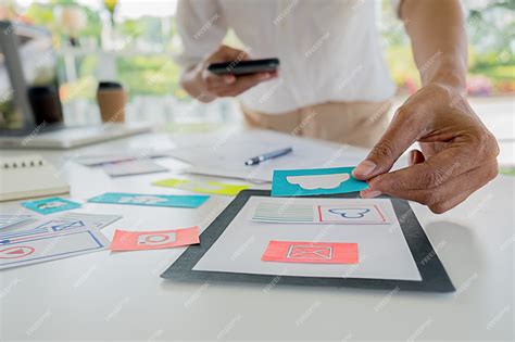 Premium Photo Creative Web Designer Planning Application And Developing Template Layout