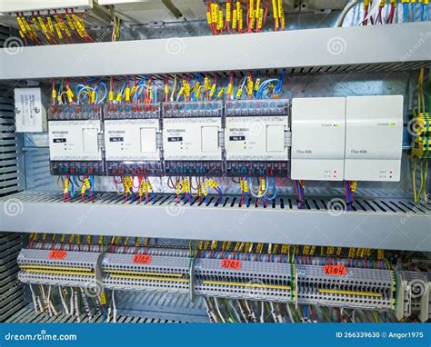 Mitsubishi PLC Modules In A Row In Electrical Cabinet Of Automation