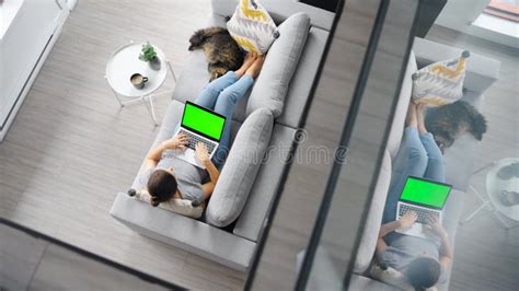 Overhead Shot Of Woman Using Laptop With Green Mock Up Screen Stock Footage Video Of Lifestyle