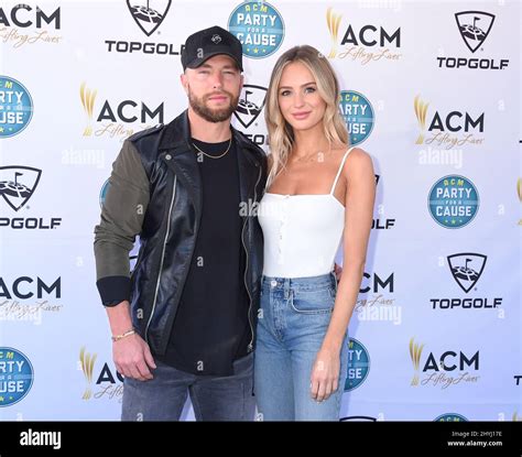 Chris Lane And Lauren Bushnell Arrive At The Acm Lifting Lives Topgolf
