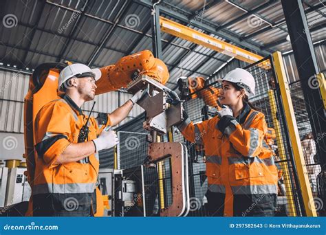 Engineer Team Service Robot Welding Working In Automation Factory
