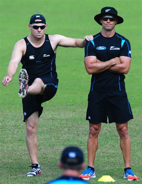 Nathan Mccullum Stretches During A Training Session