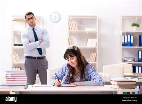 Male Lecturer Giving Lecture To Female Babe Stock Photo Alamy
