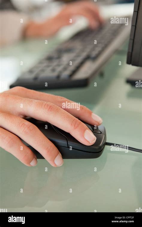 Woman S Hand Moving A Mouse Stock Photo Alamy