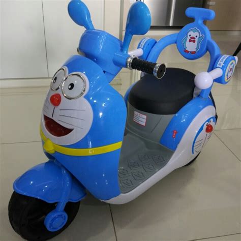 Doraemon Electric Bike Toy Hobbies And Toys Toys And Games On Carousell