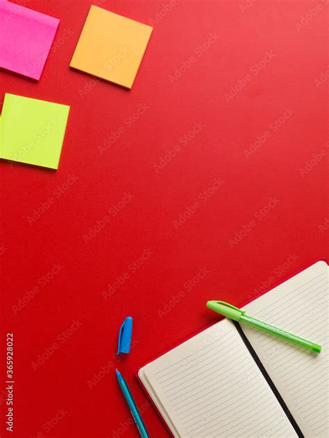 red open notebook