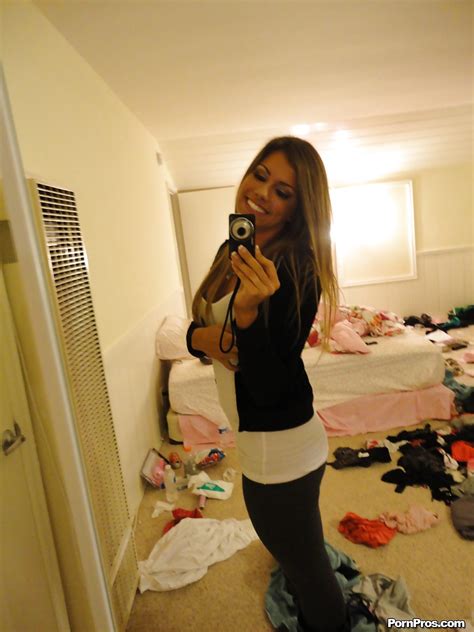 Amateur Bella Beyle Strips To Make Some Homemade Shots In Lingerie Porn