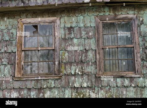 Detail Of A House With Windows And Wooden Shingles Of A House In Ancud Chiloe Island Southern
