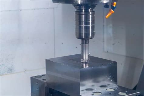 Premium Photo Cnc Machine Tool Cutting Raw Material In Factory