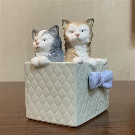 Порцелянова статуетка Nao By Lladro «мурликальний подарунок — ціна 1500 грн у каталозі