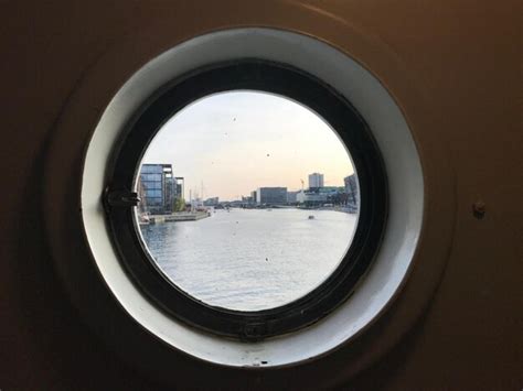 View Of City Through Window Premium Photo