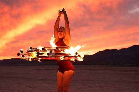 Watch Circus Performer Breaks World Record With Eight Flaming Hula Hoops