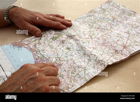 Man Looking At A Map Stock Photo Alamy