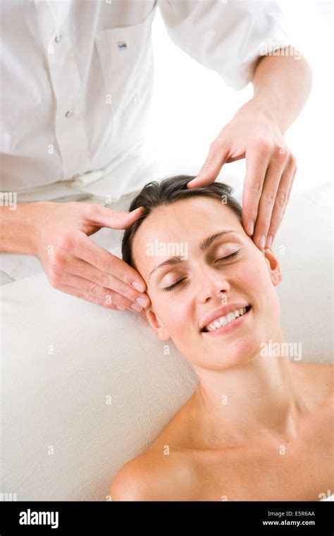 Woman Getting Face Massage Stock Photo Alamy