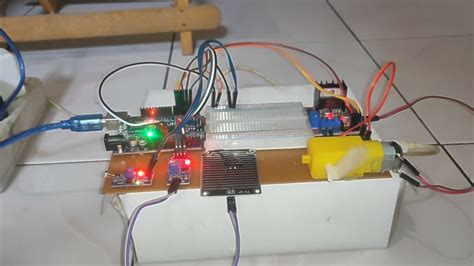 Miniatur Sistem Jemuran Otomatis Berbasis Arduino Ldr Sensor Rain Sensor Dan Motor Dc Youtube