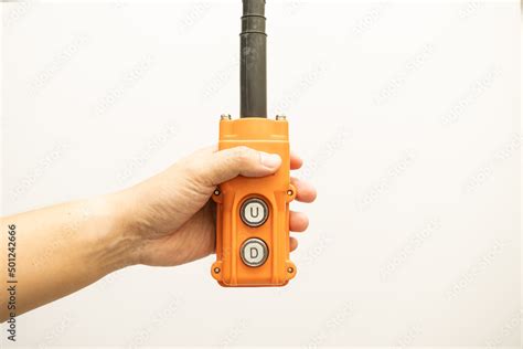 Hoist Push Button Switch In Isolated Hand Holding Overhead Cranes Remote Up Down Hydraulic