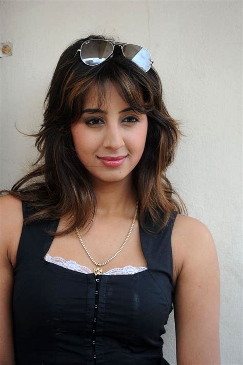 Indian Actress Sanjana Hot And Sexy Photoshoot At Latest Event Showing Thunder Thighs