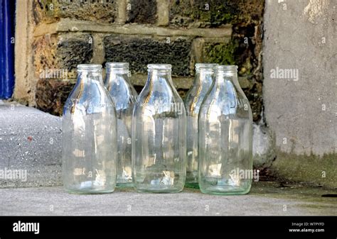 Five Empty Glass Milk Bottles On Doorstep Highbury London Borough Of
