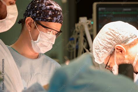Surgeon Face In Operating Room Stressful Operation Surgeon Performs Operation In Modern