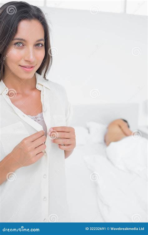 Portrait Of A Woman Sneaking Out Of Bed Stock Image Image 32232691