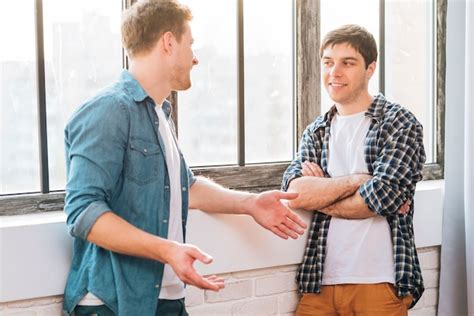 Guy Friends Talking To Each Other