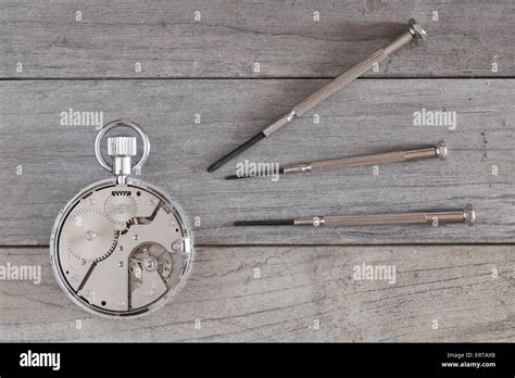 Repairing An Old And Broken Clock Stock Photo Alamy