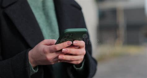 Girl Using Texting Mobile Phone Or Chat Close Up Of Woman Hand