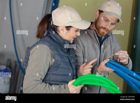 Female And Male Builders At Construction Site Stock Photo Alamy