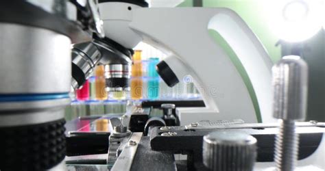 Examining Samples Under A Microscope In A Laboratory Stock Video Video Of Glassware