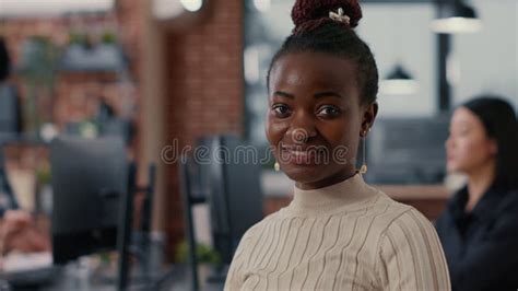 Portrait Of Smiling African American Software Developer Looking At