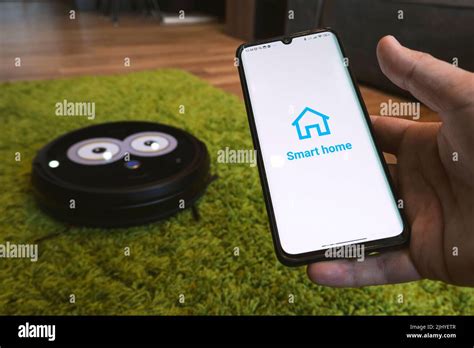 Smart Home App On Smartphone Remote Control Of Electronic Devices In Apartment Concept Of