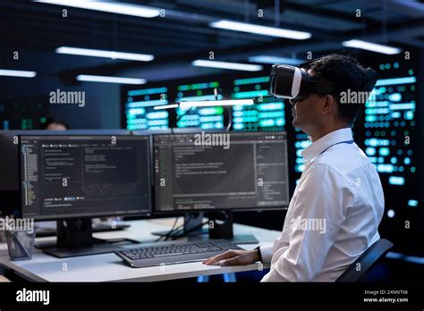 Developer Immersed In Virtual Reality In Server Hub Doing Units Maintenance Technician Using