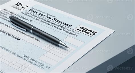 W 2 Tax Form For Year 2025 With Pen Close Up For Financial Reporting