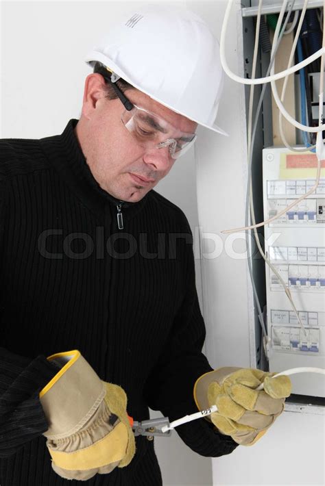 Man Fixing Fuse Box Stock Image Colourbox